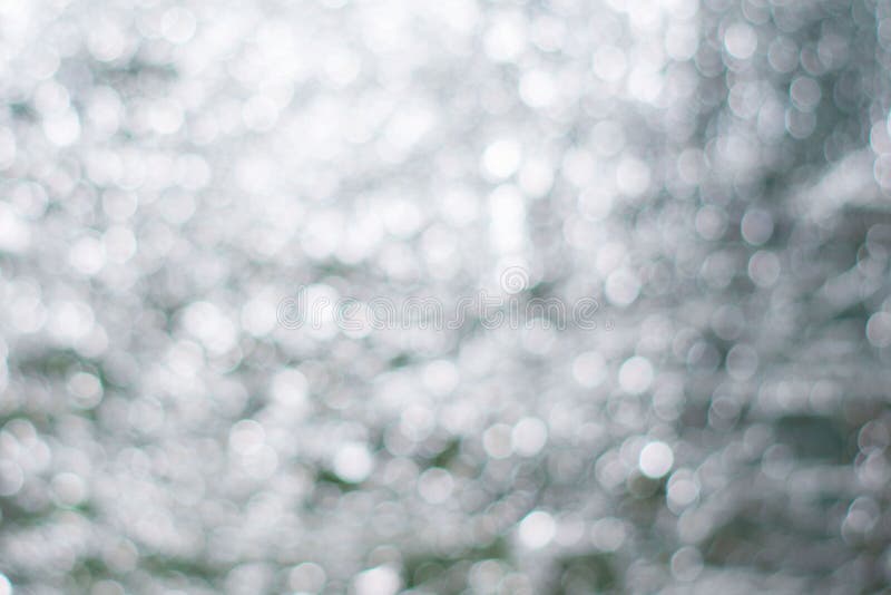 Blurred View of Abstract Silver Background. Bokeh Effect Stock Photo ...