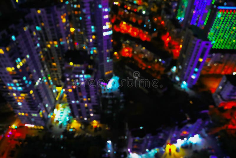 Blurred View of City with Buildings at Night Stock Image - Image of ...