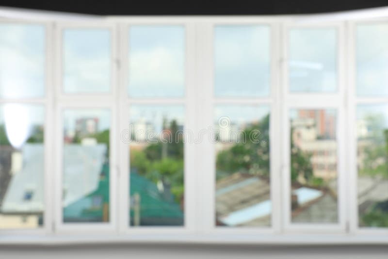 Blurred View of Cityscape through White Windows Stock Image - Image of ...