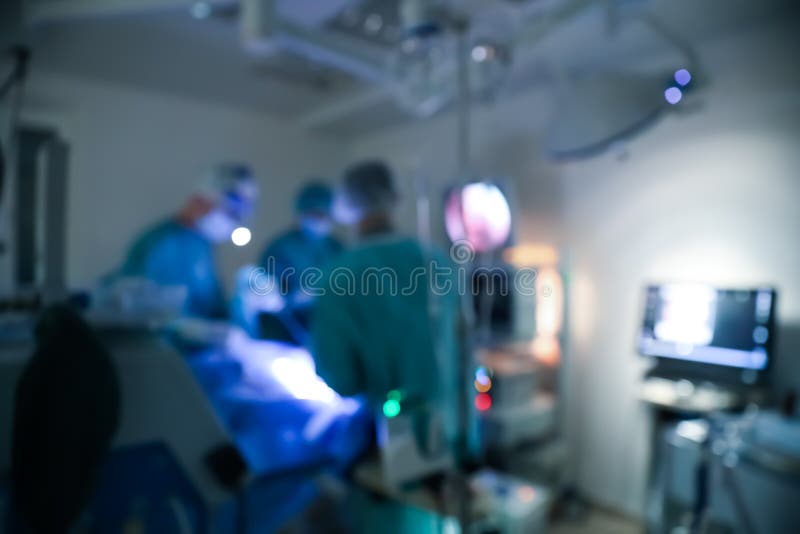 View of Doctors Operating Patient in Surgery Room Stock Image - Image ...