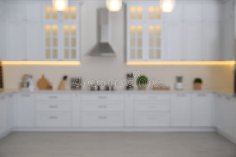 Blurred View of Modern Stylish Kitchen Stock Photo - Image of blur ...