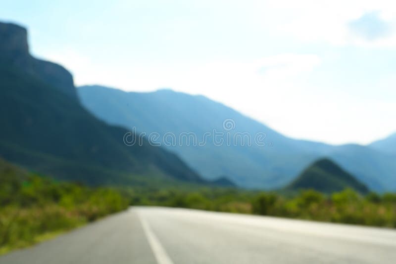 Blurred View of Mountains and Empty Asphalt Highway Outdoors. Road Trip ...