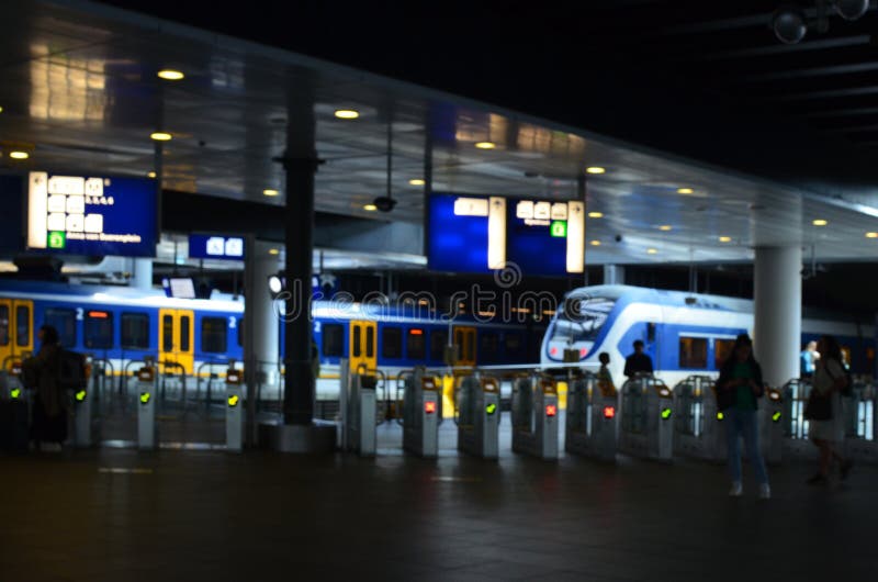 Blurred View of Railway Station with Platforms at Night Stock Image ...