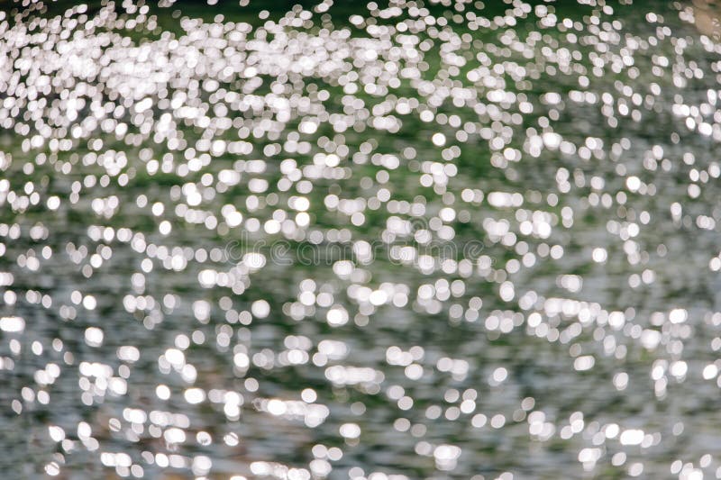 Blurred Water Surface with Sun Flares, Reflection on Water, Sunny Day ...