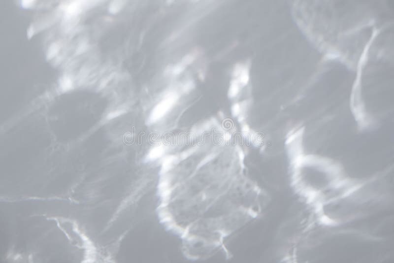 Shadow and Light Caustic Effect on a White Wall Stock Photo - Image of ...