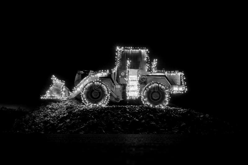 Blurred Wheel Loader Decorated with Lights Stock Photo - Image of glow ...