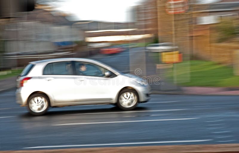 Blurred White Car Driving in Town. Stock Photo - Image of insurance ...