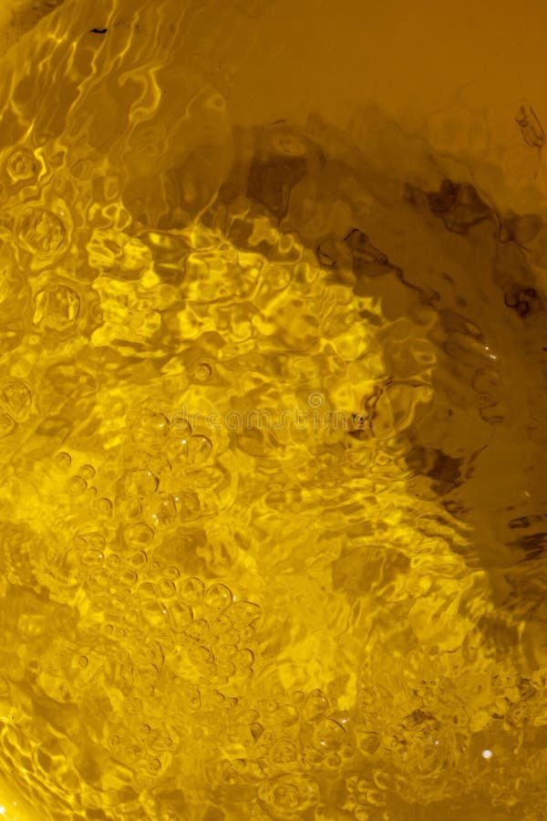 Blurred Yellow Abstract Background of Reflection of Running Water with ...
