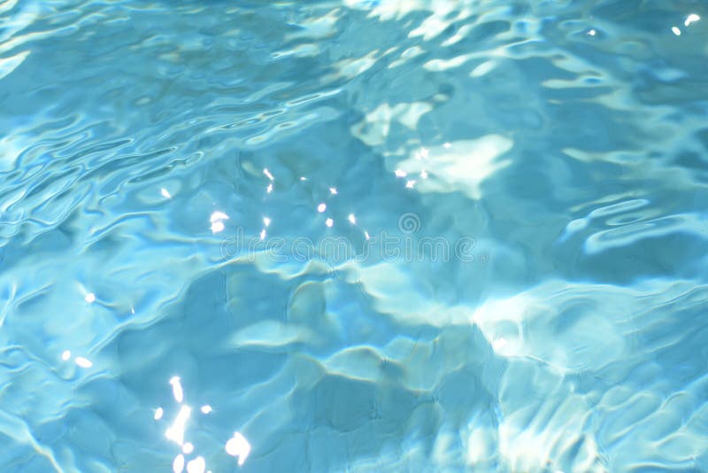Blurry Blue Wavy Water Surface with Sun Flare. Blue Water Texture Stock ...