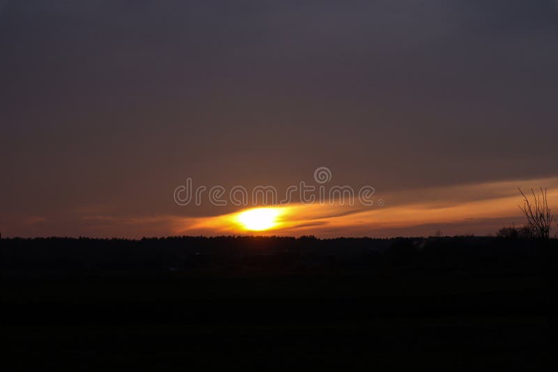 Blurry Bright Ball of Sun in the Evening Sky during Sunset Stock Photo ...