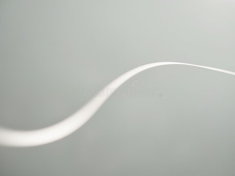 A Blurry Image of a Curved Line with a Gray Background. Stock Image ...