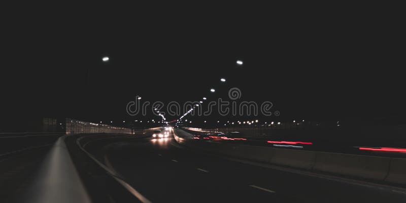 Blurry Image of a Road Bridge at Night Stock Image - Image of blur ...