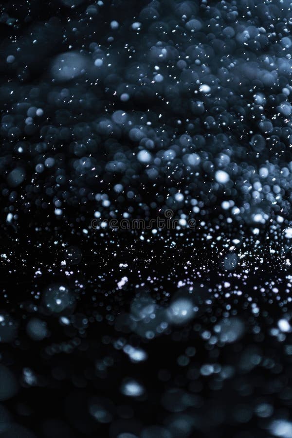 A Blurry Image of Snowflakes Falling from the Sky Stock Photo - Image ...