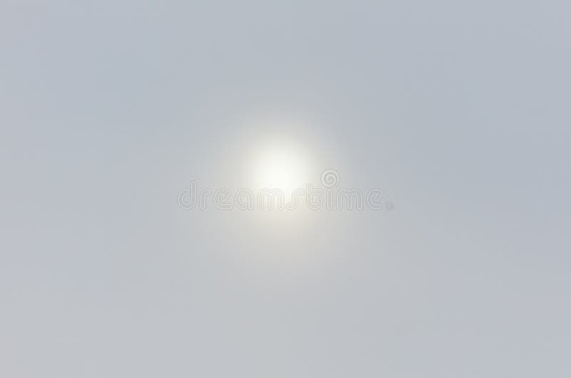 A Blurry Image of a Sun with a White Circle in the Middle Stock Image ...