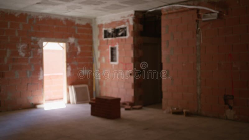 Blurry Image of an Unfinished Construction Site with an Open Door and ...