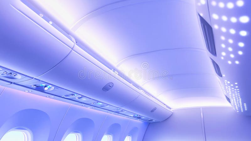 Blurry Lights Illuminating an Airplane Cabin Overhead during a ...