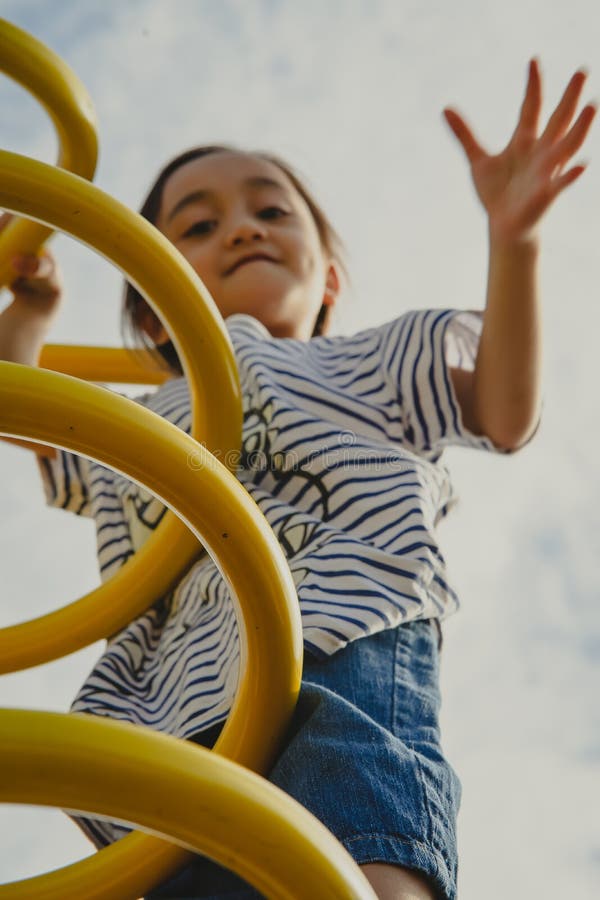 Blurry Low Angle a Little Girl Playing at the Playground Stock Image ...