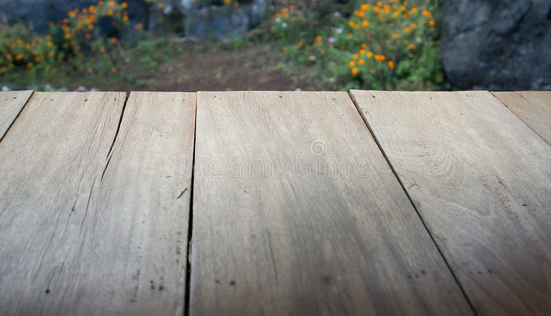 A Blurry Park Scene with a Wooden Front Terrace with Empty Space Stock ...