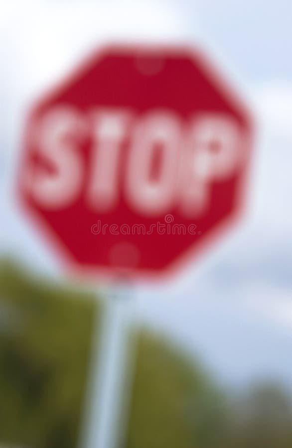 Blurry stop sign stock photo. Image of road, nearsightedness - 16035552