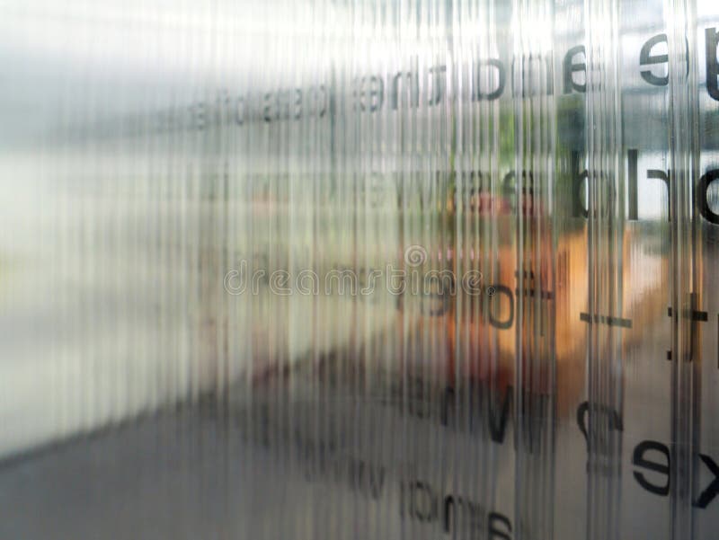 Blurry Text on Translucent Textured Surface Stock Photo - Image of ...