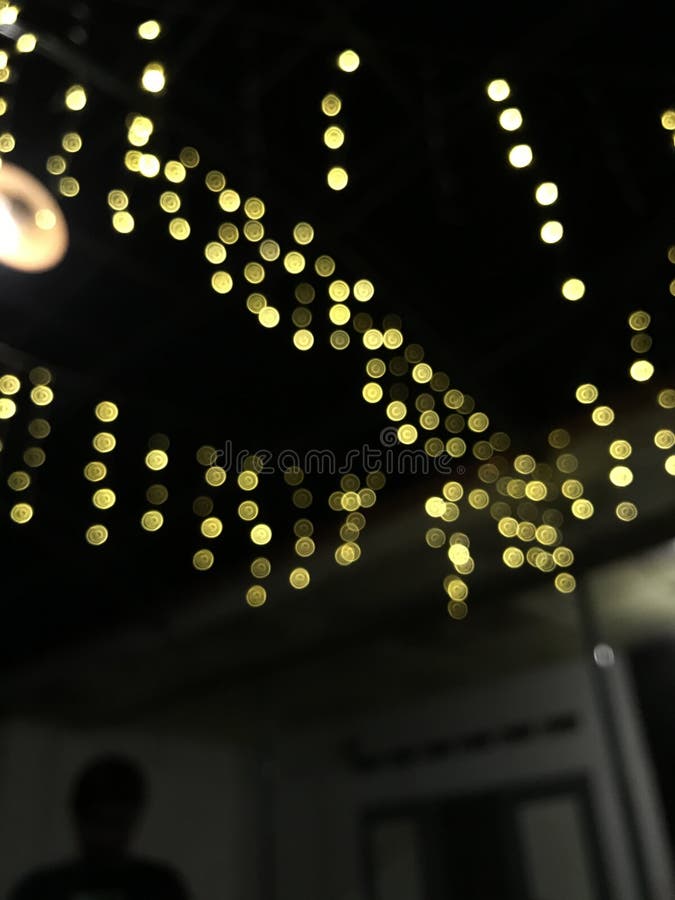 Blurry Yellow Light in a Dark Night View Stock Image - Image of ...