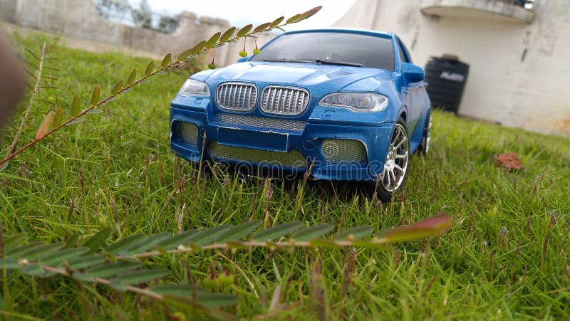 BMW Car in lawn stock image. Image of green, blue, lawn - 166764105