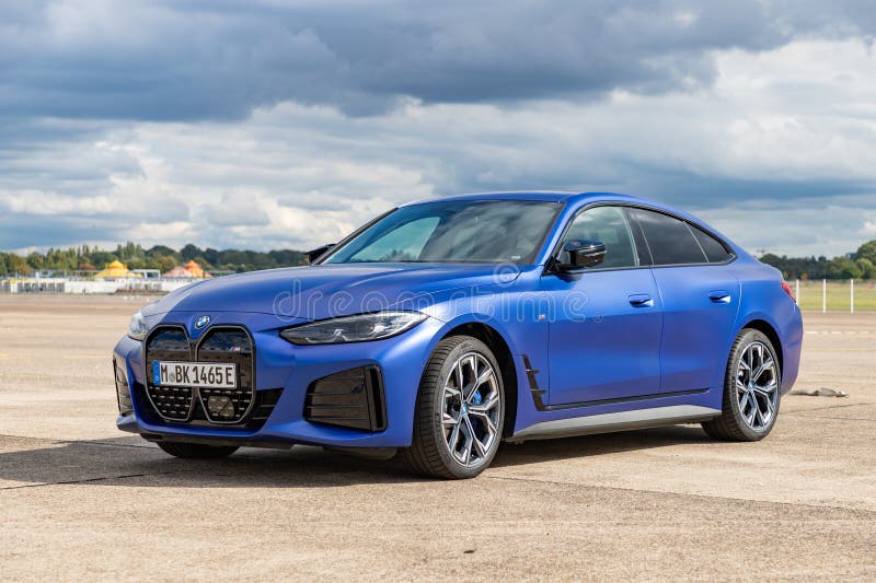 BMW i4 editorial stock photo. Image of clouds, front - 300491883