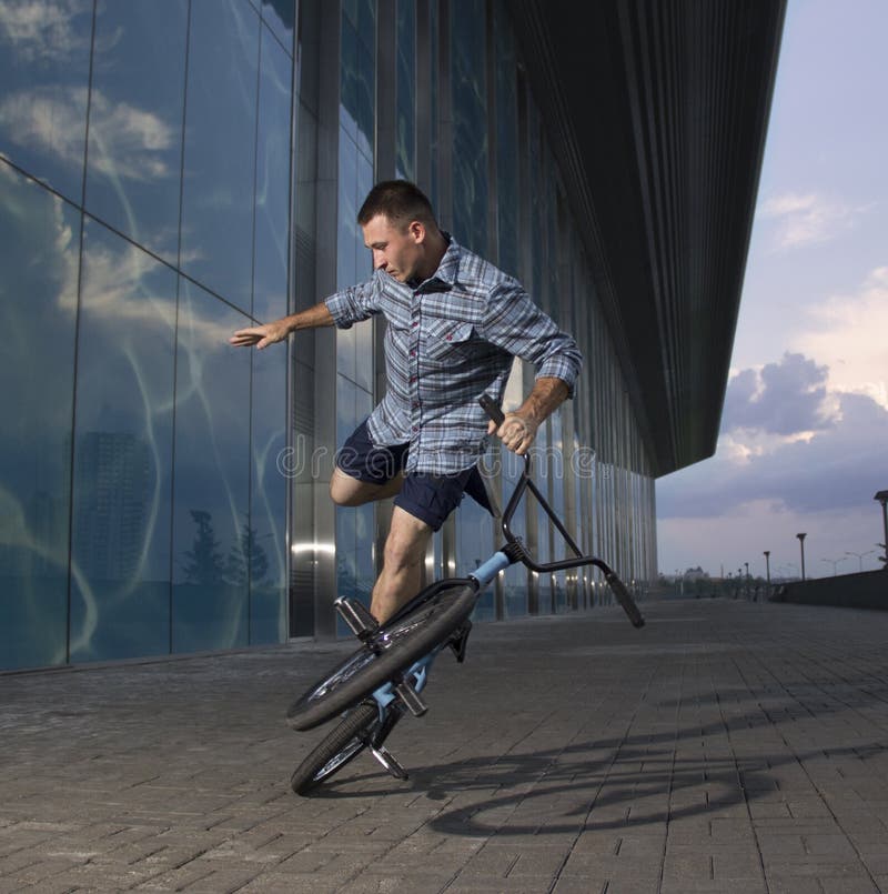 Bmx Freestyle. a Man on Bmx Doing Tricks. Stock Photo - Image of ...