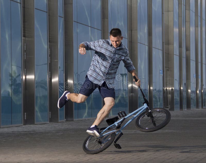 Bmx Freestyle. a Man on Bmx Doing Tricks. Stock Photo - Image of ...