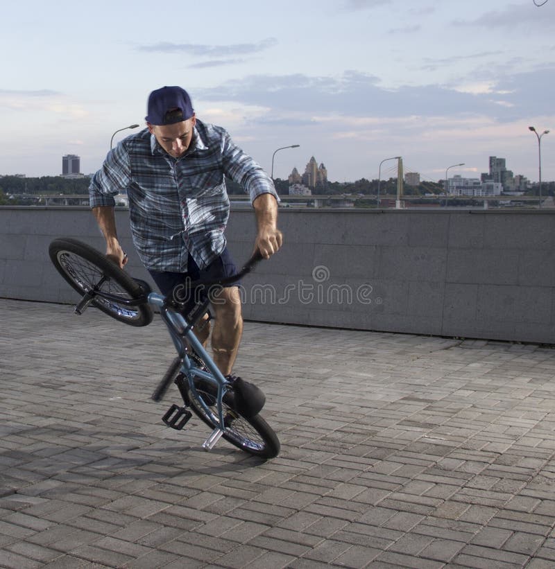 Bmx Freestyle. a Man on Bmx Doing Tricks. Stock Photo - Image of bike ...