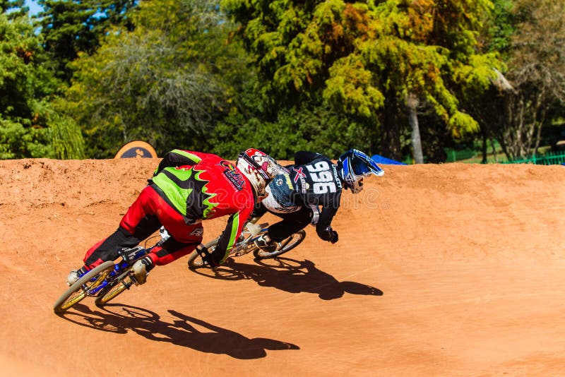 BMX Racing Riders Last Corner, Bmx cycle race senior finals with two ...