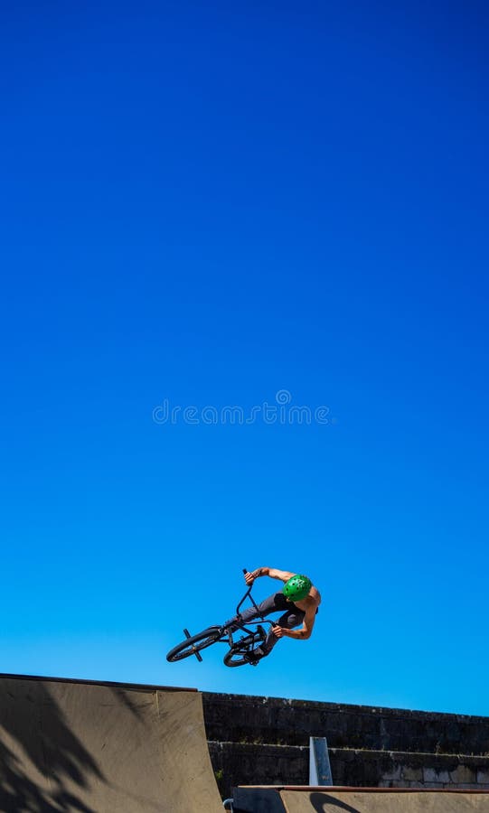 Bmx Rider on a Competition Jumping on a Ramp Stock Photo - Image of ...