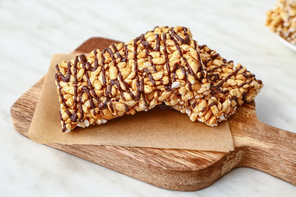 Board with Crispy Rice Bars on Table Stock Image - Image of cereal ...