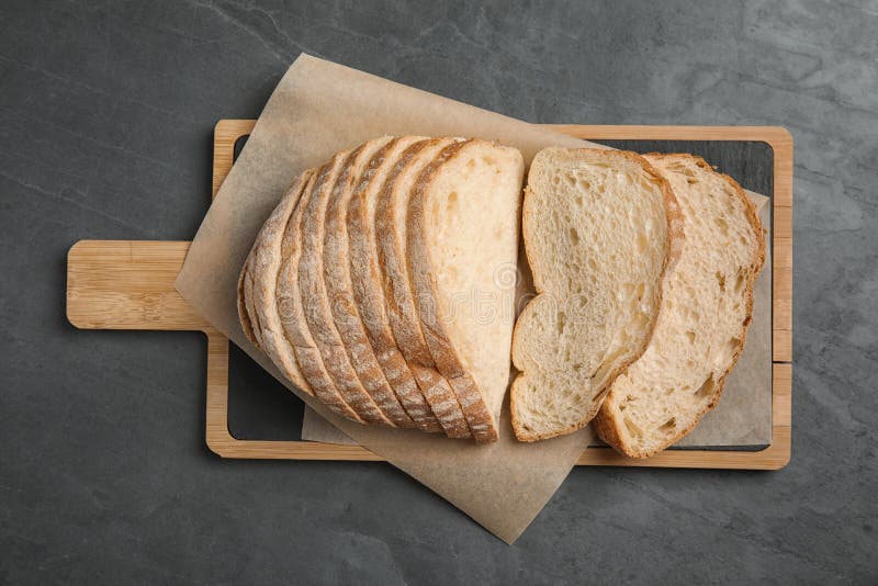 Board with Cut Bread on Grey Table Stock Image - Image of flat, food ...