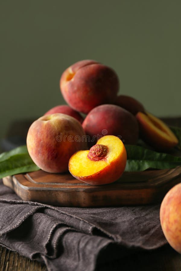 Peaches on Table stock photo. Image of leaves, fuzz, freshly - 15384104