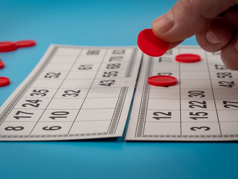 Board Game Bingo. Plastic Playing Chips in Hand Stock Image - Image of ...