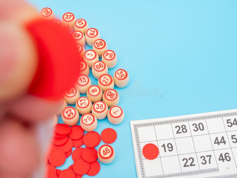 Board Game Bingo. Plastic Playing Chips in Hand Stock Image - Image of ...