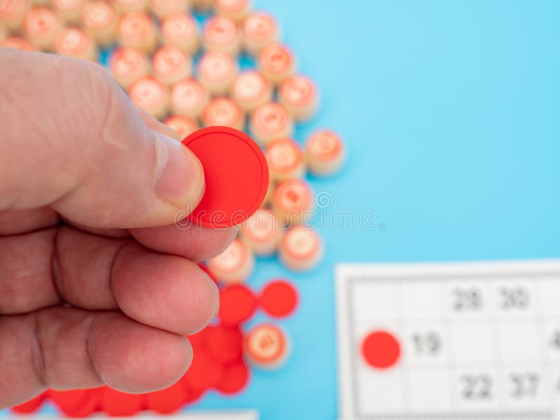 Board Game Bingo. Plastic Playing Chips in Hand Stock Photo - Image of ...