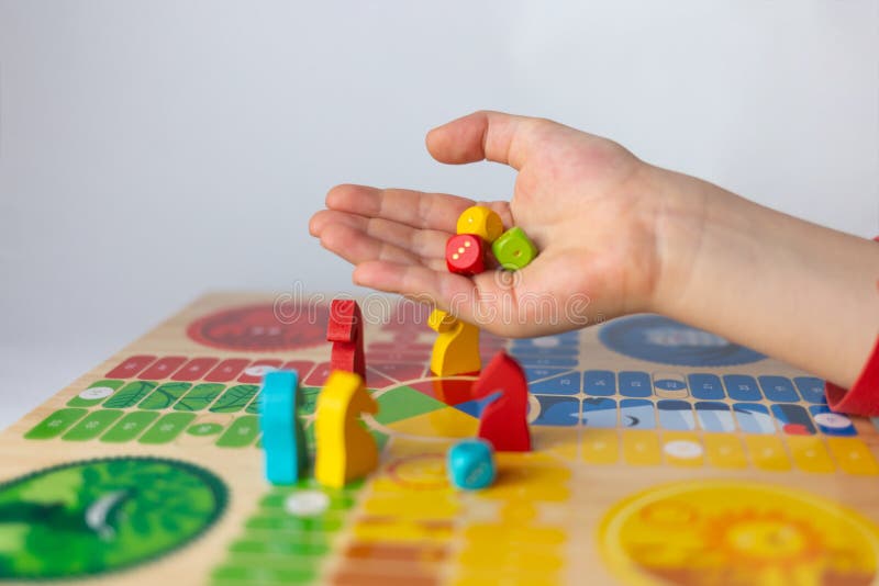 Board Game with Hand, Colorful Pieces and Die Stock Image - Image of ...
