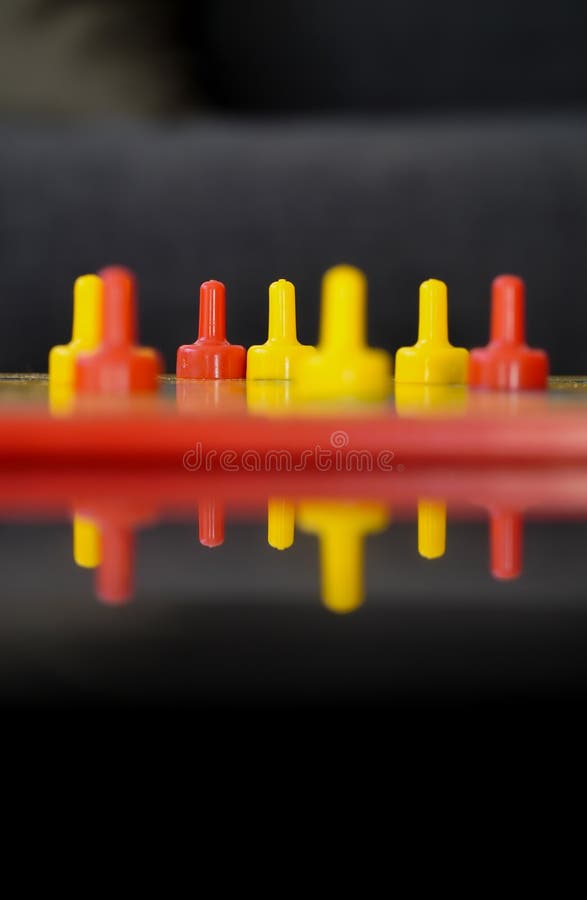 Board Game with Reflection and Red and Yellow Figures Indoor. Game at ...
