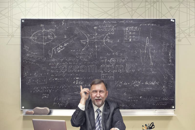 A Board with Mathematical Examples and a Teacher at the Table Stock ...