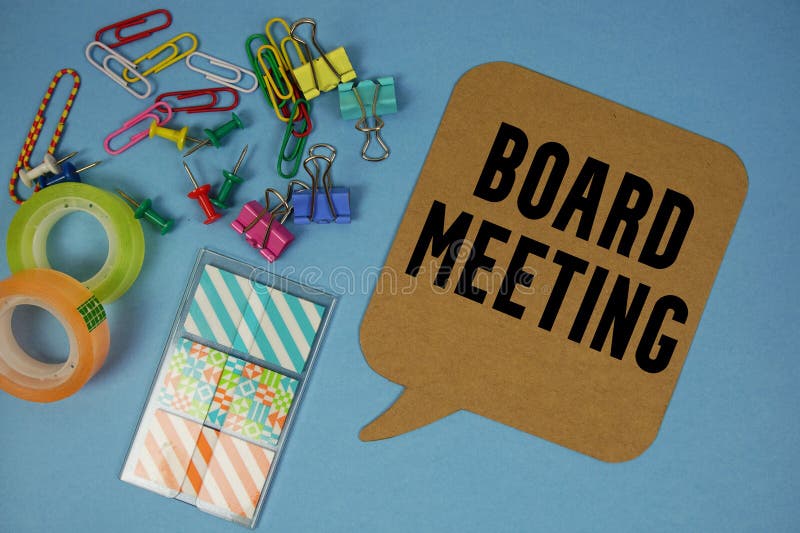 Board Meeting Text with Stationery on Blue Background Stock Image ...