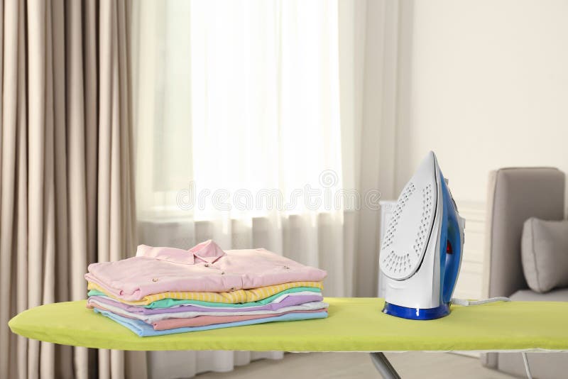Board with Modern Iron and Clean Laundry Stock Image - Image of ...