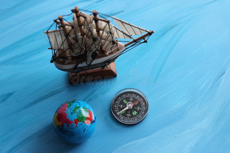 Top View of Wooden Sailing Ship Mockup, Compass and Globe on Painted ...