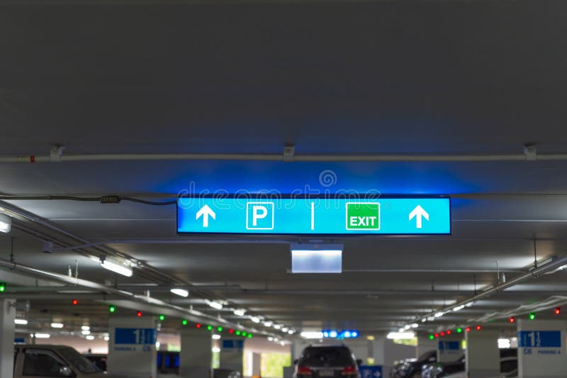 Direction Parking Area Sign on Wooden Panel with Arrow on the Pole ...