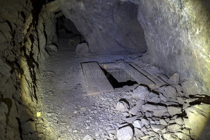 Boarded Over Structures Protect Mine Shaft Going Straight Down into the ...