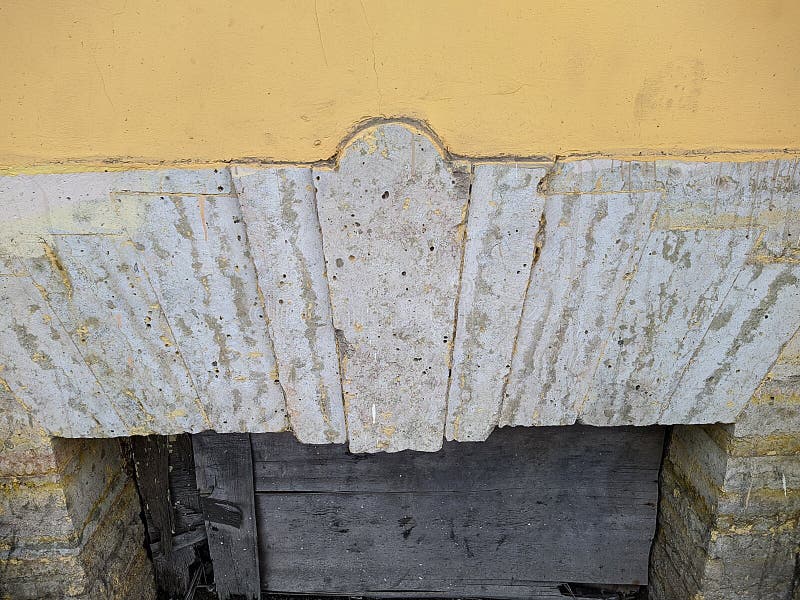 Boarded Up Basement Window of the Building View from the Street. Stock ...