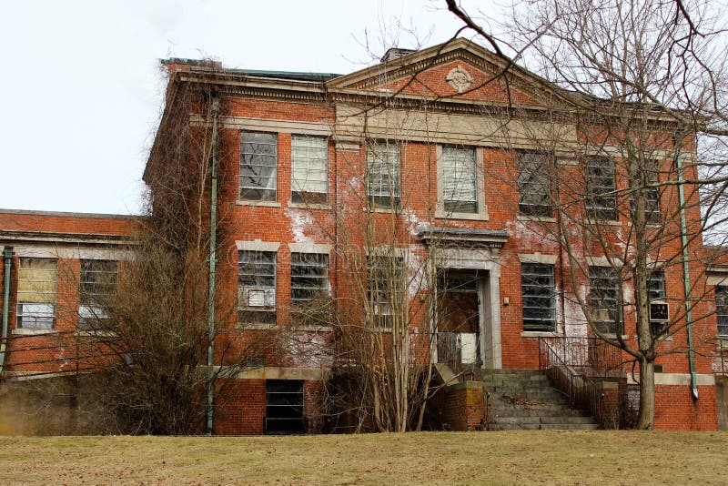 Old Broken Windows on Abandoned Brick Asylum Building Stock Photo ...