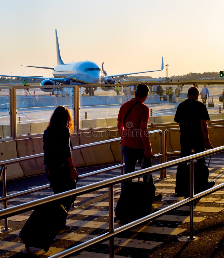 Boarding plane at airport editorial photography. Image of line - 105416617