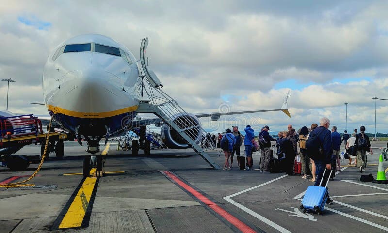 Boarding the Plane on the Tarmack Stock Photo - Image of airport, plane ...